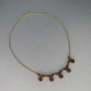 Collier in 900/- Silber und Gold mit roten Granatsteinen, € 240,00